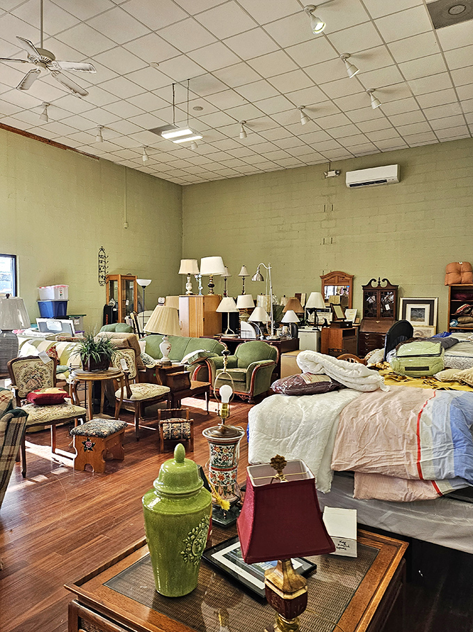 Furniture heaven awaits with enough seating options to host the world's coziest family reunion. That green ceramic jar is practically begging to come home with you.