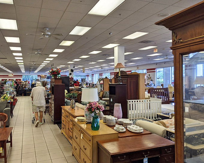 Furniture arranged with the care of a museum curator, each piece waiting for its second act. That white cabinet could tell stories from its first home.