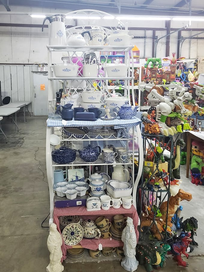 Blue and white ceramics stacked like a porcelain tower of Babel. Grandma's china pattern is hiding in here somewhere.
