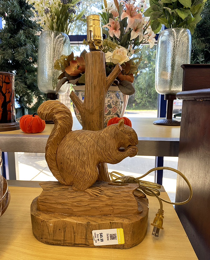 A hand-carved wooden squirrel lamp that somehow manages to be both kitsch and charming—someone's castoff becomes another's conversation piece.