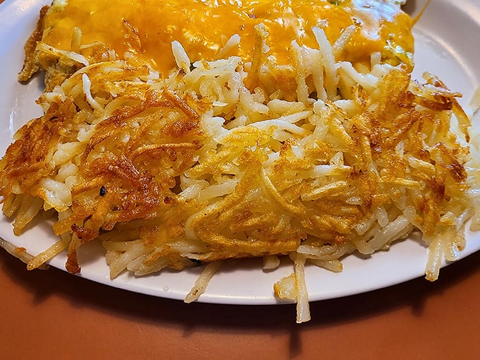 Behold the star of the show – hash browns with that mythical balance of golden crispiness outside and tender potato within. Poetry on a plate.