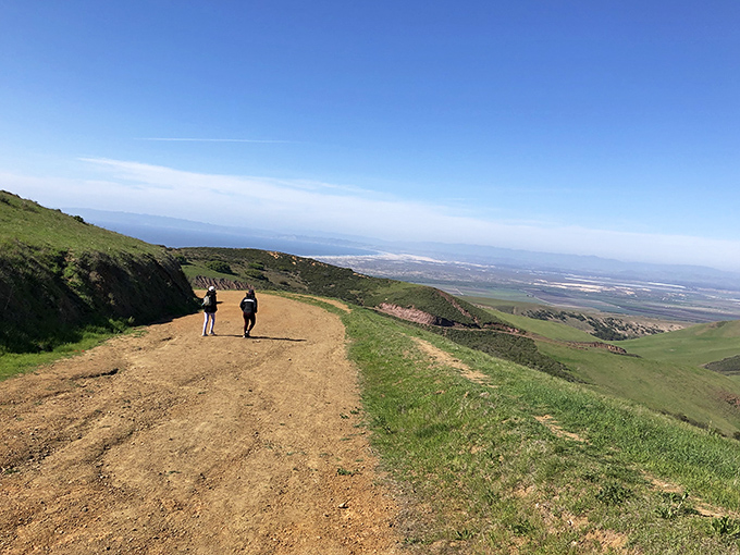 The path less traveled isn't just a metaphor here—it's two hikers experiencing what might be California's most rewarding trail-to-beach ratio.