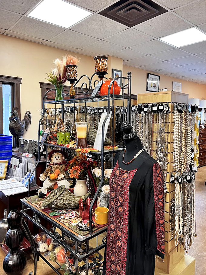 Seasonal decor meets fashion forward&mdash;this mannequin's paisley ensemble and surrounding treasures prove that "thrifted" and "curated" aren't mutually exclusive concepts.