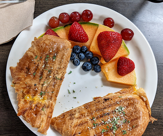 Breakfast artistry at its finest &ndash; a golden omelet flanked by fresh berries. Who knew healthy and indulgent could coexist so beautifully?