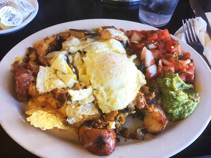 This isn't just breakfast, it's edible architecture &ndash; layers of flavor with eggs as the crowning glory and salsa as the colorful foundation.