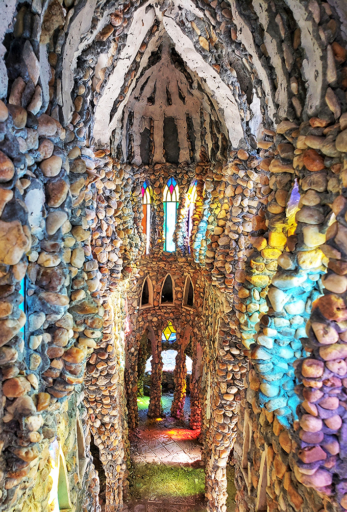 Step inside and be transported to a kaleidoscopic wonderland. The stained glass transforms ordinary sunlight into an extraordinary light show.