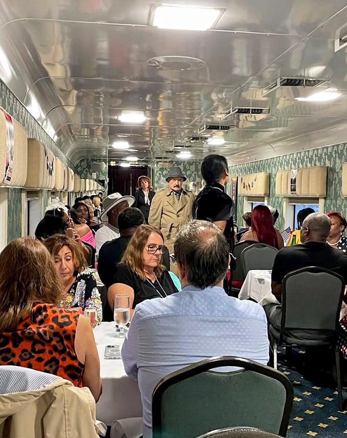 Inside the dining car, murder mystery actors work the room while passengers enjoy dinner with a side of theatrical intrigue.
