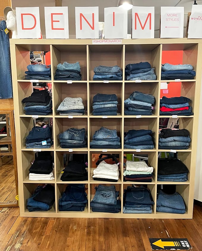 Denim heaven organized with military precision. This IKEA-worthy display proves thrifting doesn't have to mean digging through chaotic piles.