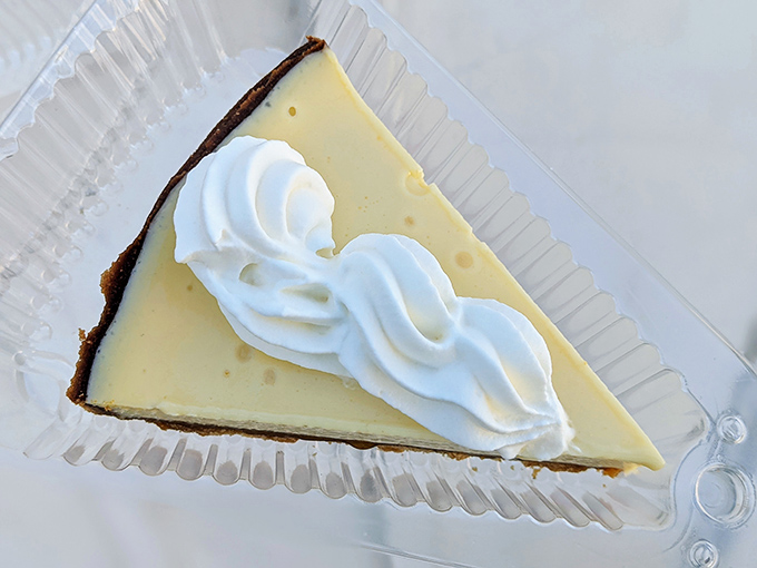 Key lime pie perfection: a pale yellow filling that walks the tightrope between sweet and tart, topped with just enough whipped cream to make you forget your troubles.