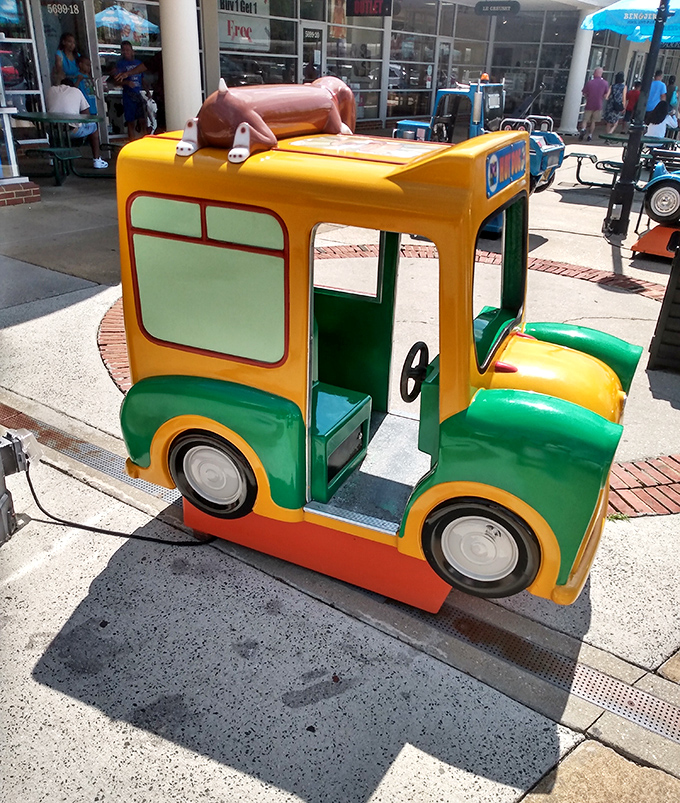 Even the little ones get a shopping break! This cheerful kiddie ride offers a moment of joy between stores&mdash;because future bargain hunters need training too.