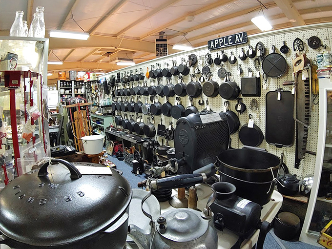 Cast iron cookware hangs like culinary medals of honor from a bygone kitchen era.