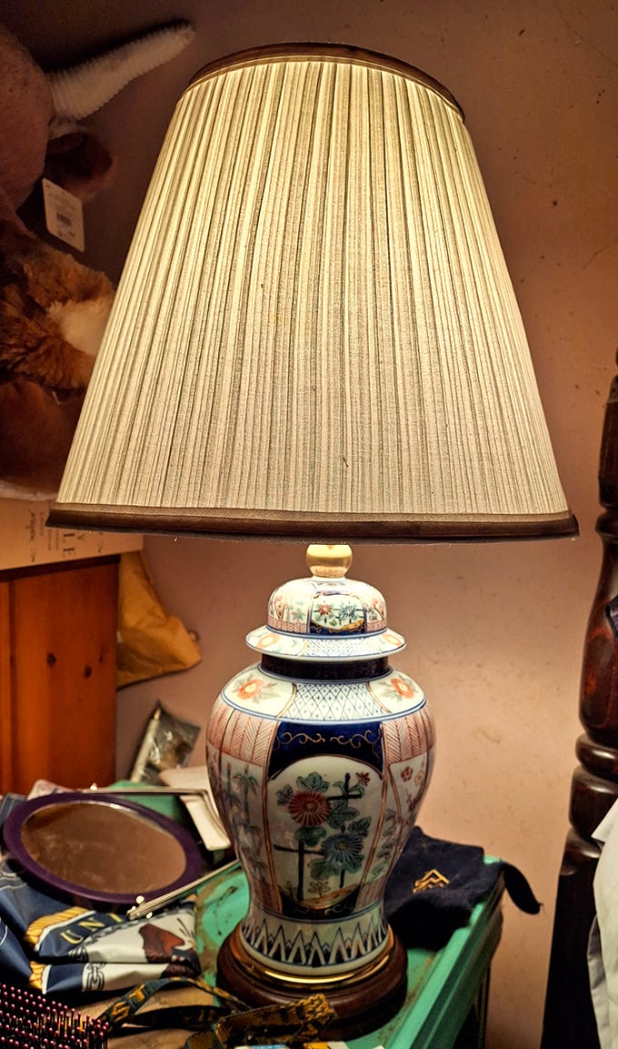 This isn't just a lamp—it's a conversation piece waiting to illuminate your most interesting dinner parties. Ming dynasty inspired, garage sale priced.