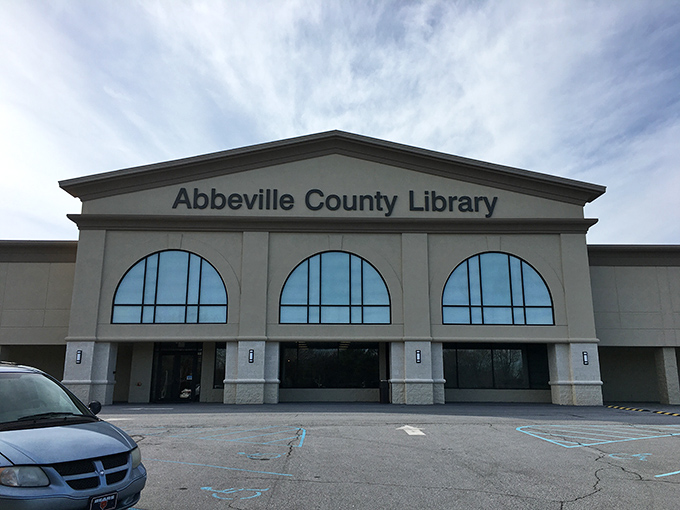 This library's arched windows whisper "come inside" louder than any bestseller list ever could.