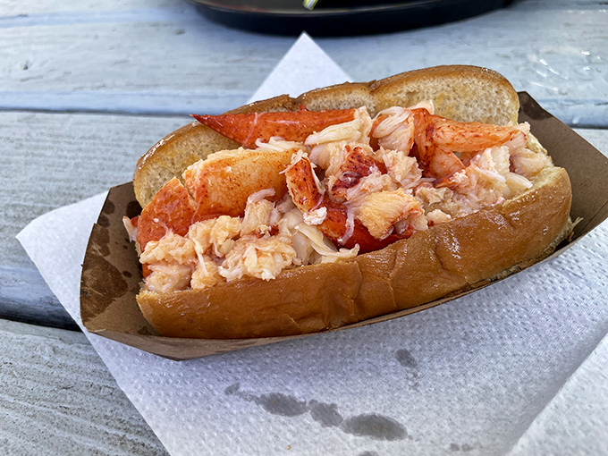 Connecticut-style lobster roll perfection &ndash; warm, buttery chunks of sweet meat nestled in a perfectly toasted roll. No mayo needed in these parts!