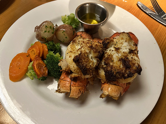 Lobster tails bronzed to perfection, like sunbathers who found the ideal spot on Fort Lauderdale's beaches. The butter sauce? Liquid gold.