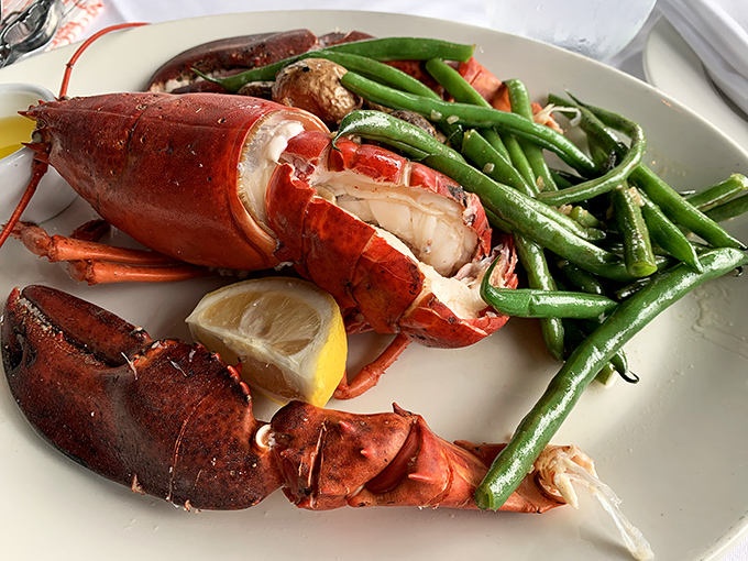 This isn't just dinner; it's a crustacean celebration. The lobster arrives like royalty, accompanied by green beans that actually make you want to eat vegetables.