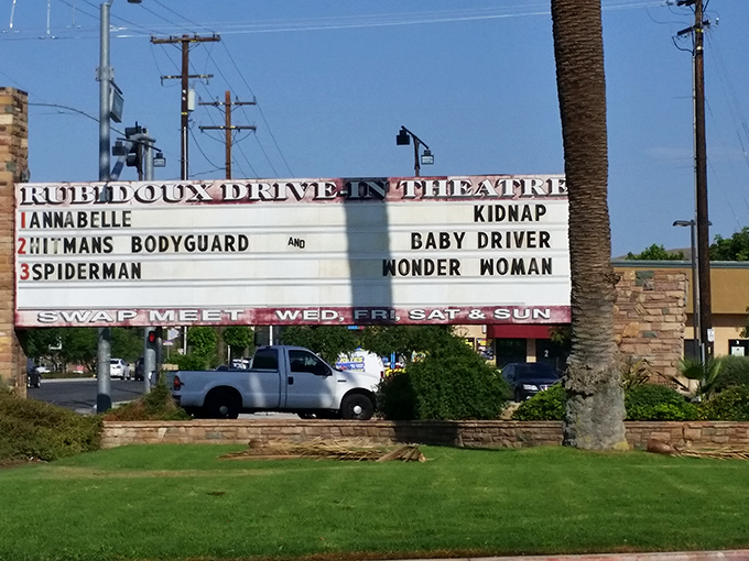 The marquee doesn't just list movies&mdash;it broadcasts possibilities for your evening, from superhero adventures to romantic comedies.