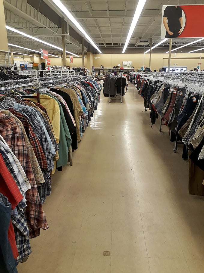 The men's section: where plaid shirts from three decades gather like a lumberjack convention waiting for their next adventure.
