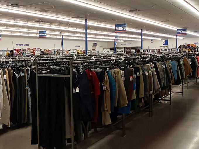 Women's tops hang in perfect formation, organized by style and size. Finding that perfect sleeveless blouse just became a military-grade operation.