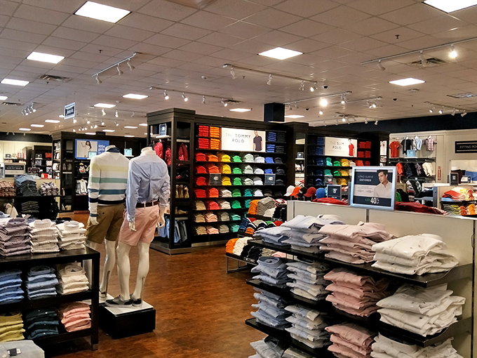 A rainbow of hats and perfectly folded shirts &ndash; retail organization so satisfying it could inspire you to finally clean out your own closet.
