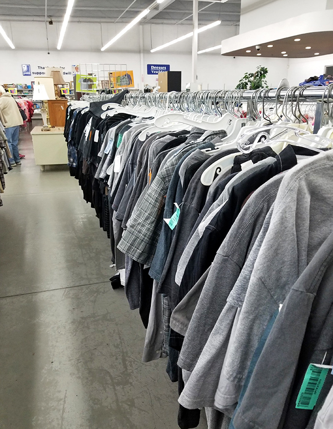 The men's section: where yesterday's business casual becomes tomorrow's vintage find, all neatly arranged by helpful color-coding.