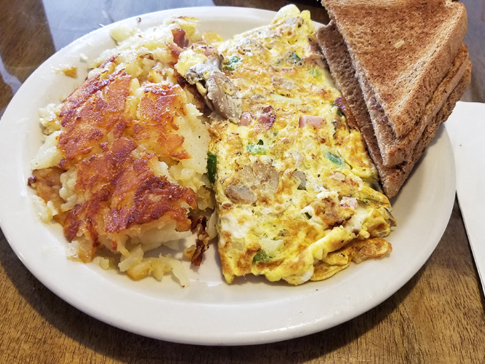 This isn't just an omelet&mdash;it's a morning masterpiece with perfectly crisped hash browns and toast that makes you question all other toast you've encountered.