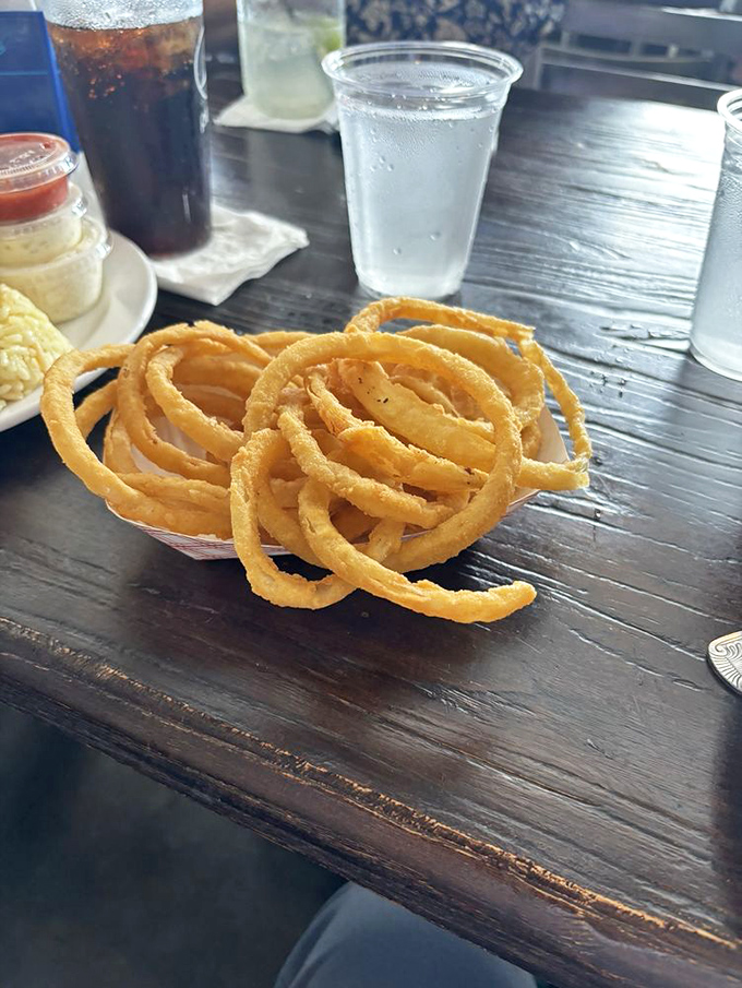 These onion rings aren't just side dishes&mdash;they're golden halos of crispy perfection that make you question why you ever settled for less.