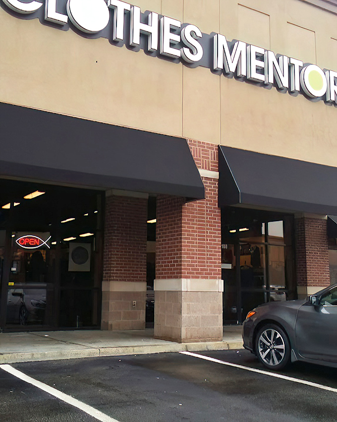 The storefront beckons with its siren call of "OPEN" &ndash; the universal sign that fashion salvation awaits just beyond those doors.