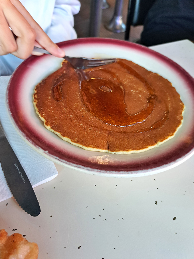 That perfect golden-brown pancake isn't just breakfast&mdash;it's a canvas awaiting its maple syrup masterpiece. 