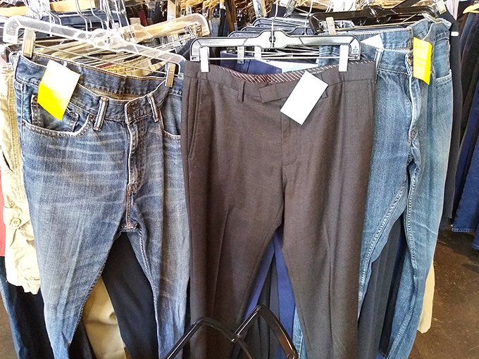 Denim dreams and dress slacks hang expectantly, each pair silently whispering, "Take me home, I promise to make your legs look fantastic."