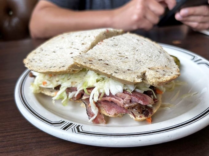 The legendary #19 in all its glory&mdash;where hand-cut pastrami, coleslaw, and Russian dressing create a sandwich worth crossing county lines for.