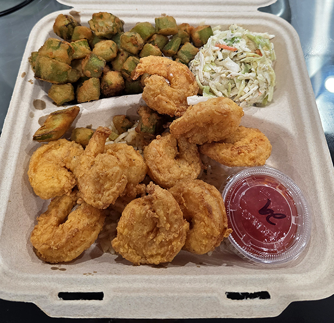 Golden-fried popcorn shrimp that actually snap when you bite them, not those sad freezer-burned pebbles masquerading as seafood at chain restaurants.
