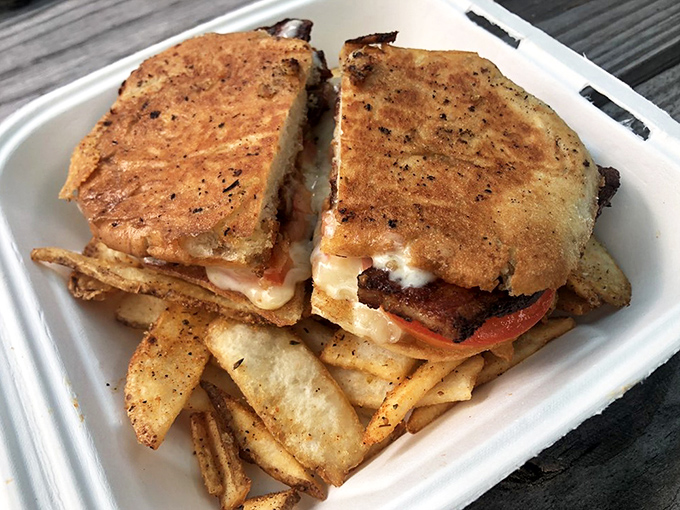 Perfectly pressed and gloriously golden, this sandwich holds secrets that make grown adults drive across county lines without a second thought.