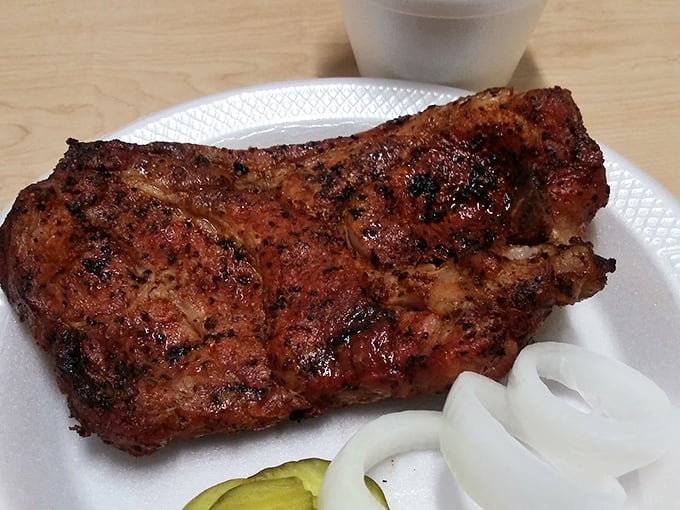 Behold the pork steak in all its glory &ndash; a mahogany-crusted masterpiece with a pink smoke ring that would make a jeweler jealous.