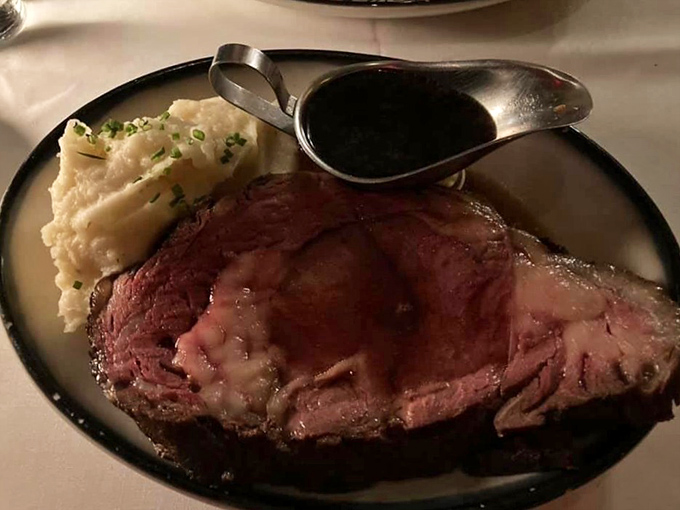 This prime rib isn't just dinner; it's a carnivore's dream with a side of nostalgia and perfectly whipped potatoes.