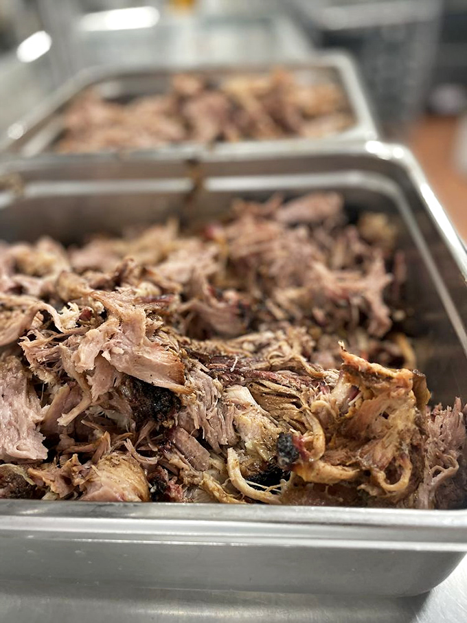Pulled pork that doesn't just fall apart&mdash;it practically introduces itself to your taste buds. Each strand tells a story of smoke, time, and patience.