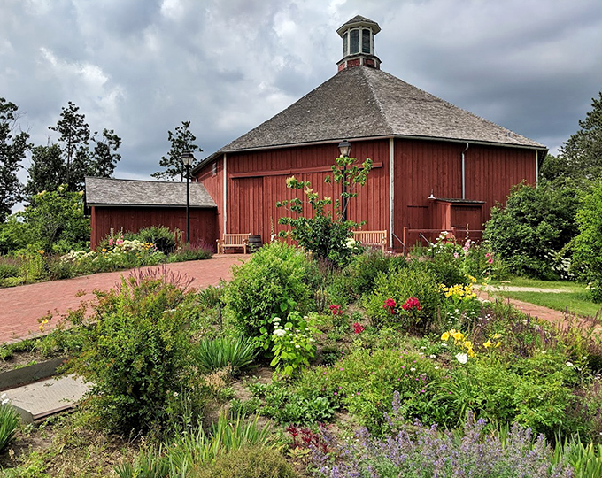 The round barn isn't just architecturally clever&mdash;it's surrounded by heritage gardens that would make any modern organic farmer tip their sustainable hat.