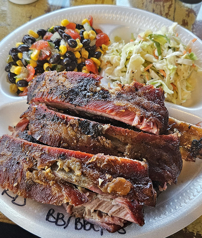 These ribs have the perfect smoke ring &ndash; paired with black bean corn salad that pretends this meal has nutritional balance.
