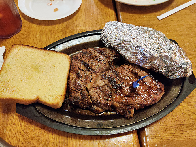 Behold the star of the show: a perfectly seared ribeye that doesn't need fancy plating to announce its greatness. That char speaks volumes.