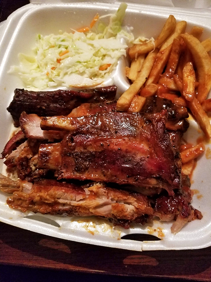 Ribs that don't just fall off the bone&mdash;they practically leap into your mouth. Served with the holy trinity of barbecue sides: slaw, fries, and dignity-be-damned finger licking.