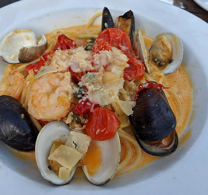 Seafood pasta that's basically a delicious underwater reunion&mdash;shrimp, mussels, and clams partying in a sauce worth sopping up with extra bread.