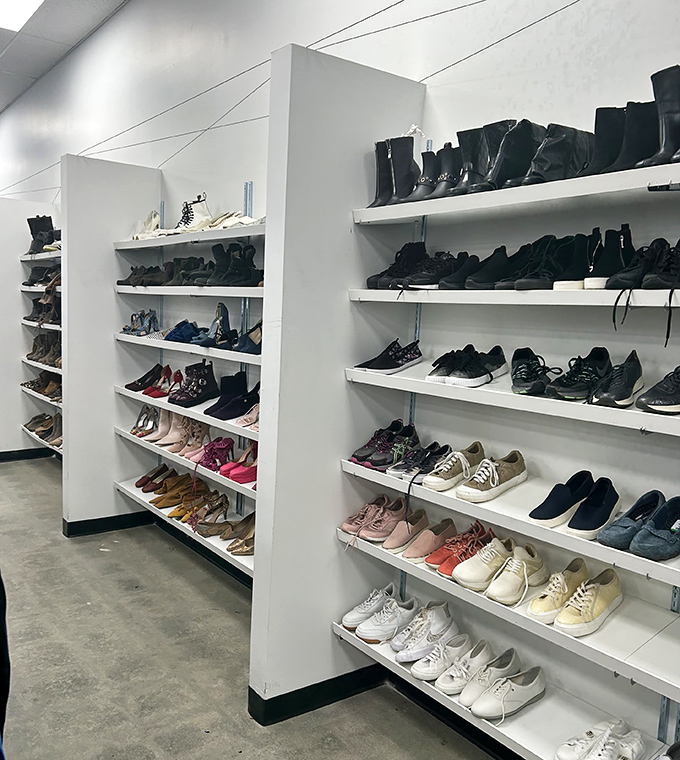 Shelves of shoes waiting for their second act, from pumps to sneakers, all deserving encores.