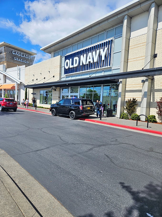 Old Navy's bold blue signage announces itself like a friendly neighbor who always has exactly what you need at prices that won't make you weep.