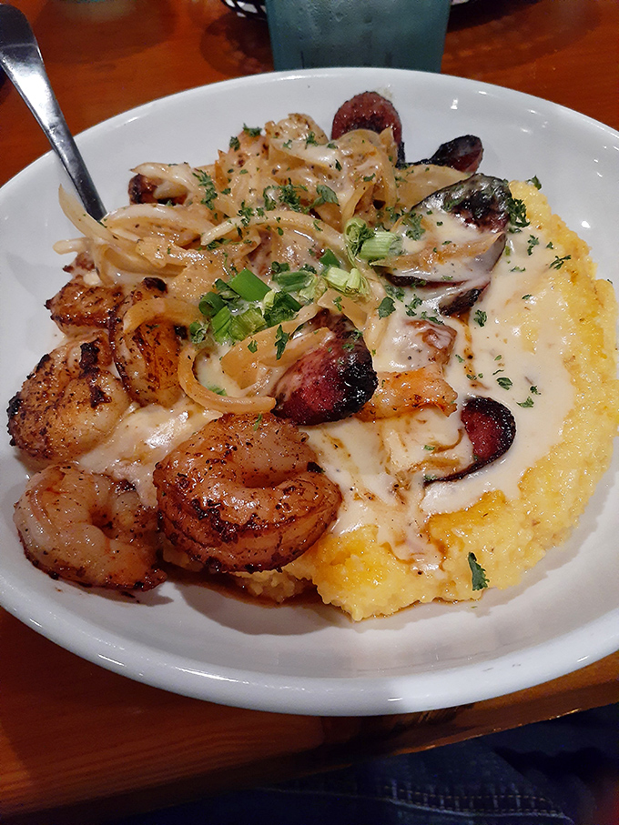 Shrimp and grits that would make a Lowcountry grandmother weep with joy. Creamy, dreamy, and worth every calorie-laden spoonful. 