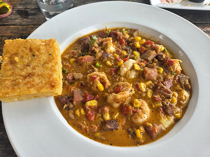 The shrimp and grits arrive like a Southern hug on a plate&mdash;creamy, smoky, and studded with enough plump shrimp to make a fisherman proud.