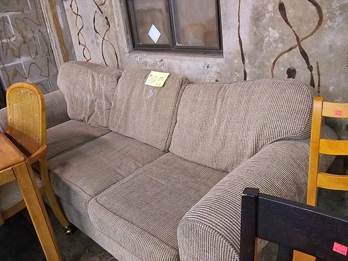 Someone's rejected sofa is about to become another person's conversation piece. At these prices, that mustard-yellow armrest is suddenly looking quite charming.
