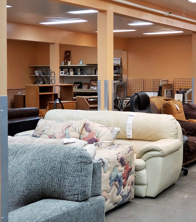 A sofa section that proves one person's "so yesterday" is another's "exactly what I've been searching for" in cream leather glory.