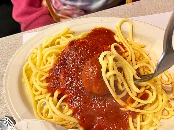 Spaghetti with meatballs that would make your nonna weep tears of joy and maybe a little jealousy.