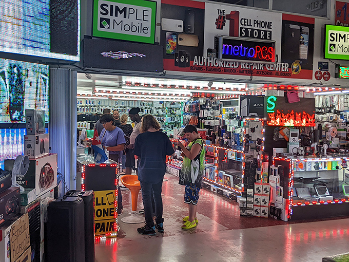 This electronics shop glows like a spacecraft control room. The blinking lights and gadget displays create a tech paradise where haggling is practically mandatory.
