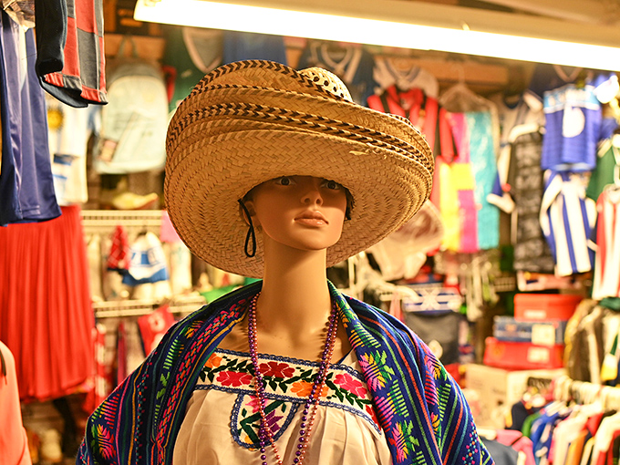 This mannequin isn't just modeling a hat; she's offering a lifestyle choice that says "I vacation fabulously and know it."